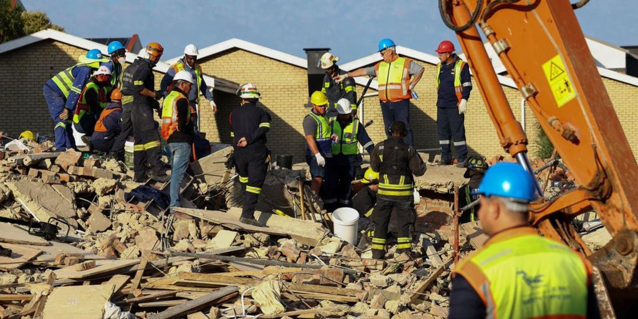 At least five killed, dozens trapped in building collapse in South ...