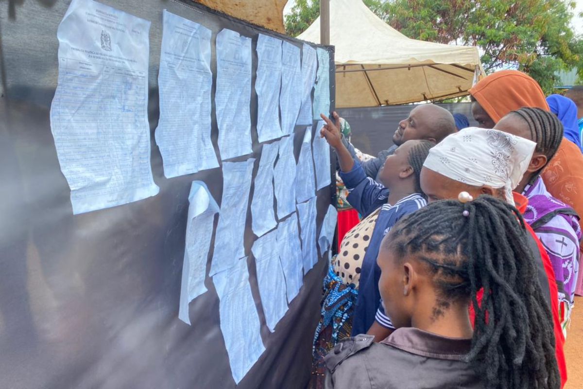 Rain disrupts voting process as voters struggle with wet ballot papers ...