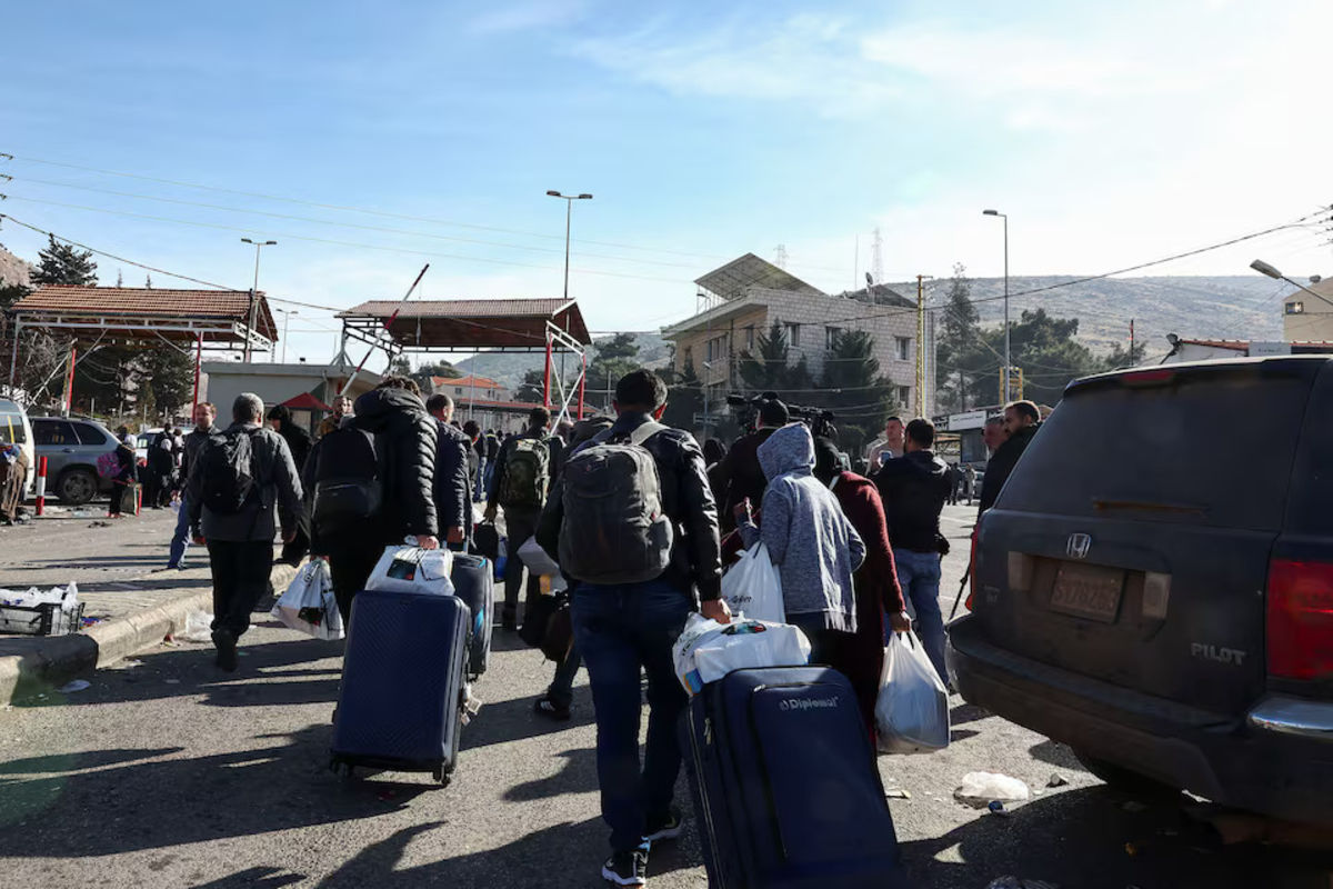 Refugees return to Syria as caretaker prime minister appointed | The ...