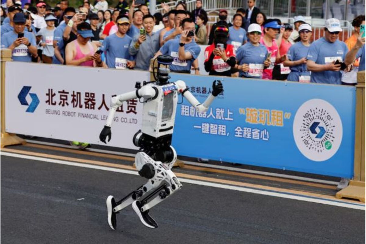 Humanoid robots race past humans in Beijing half-marathon, showing ...
